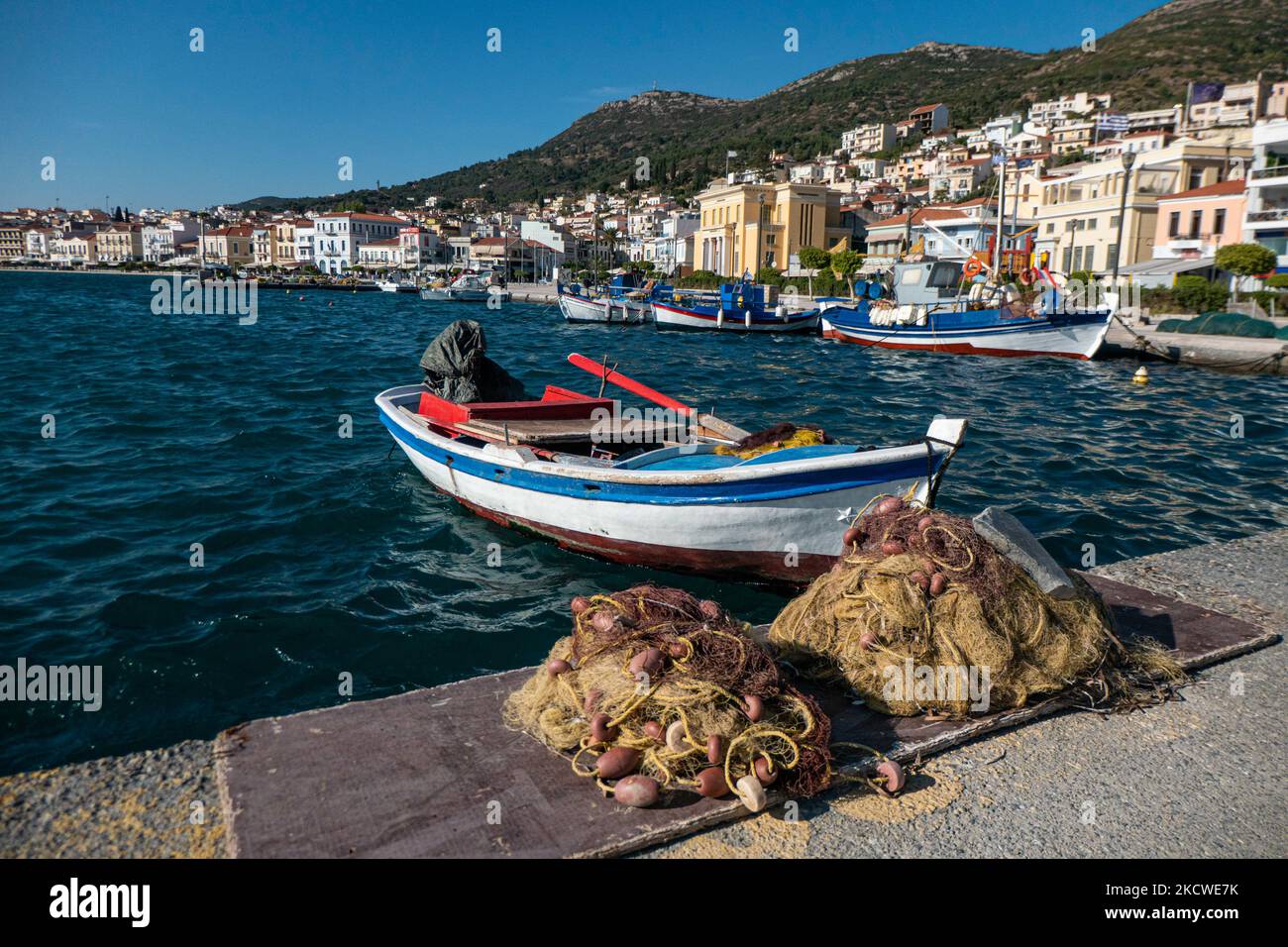 Beautiful traditional wooden fishing boats docked at the harbor of ...