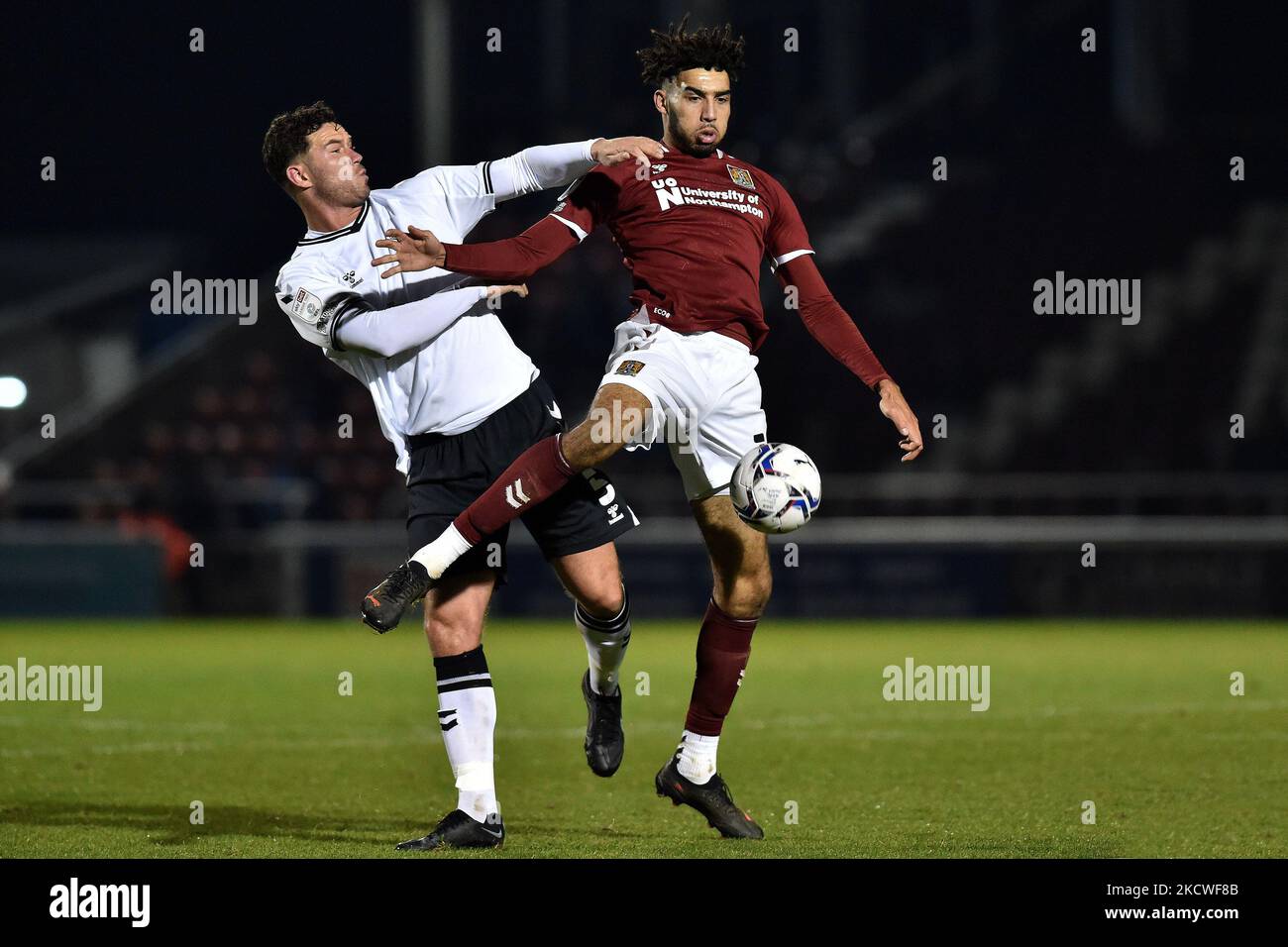 Oldham Athletic's Harrison McGahey tussles with Kion Etete of ...