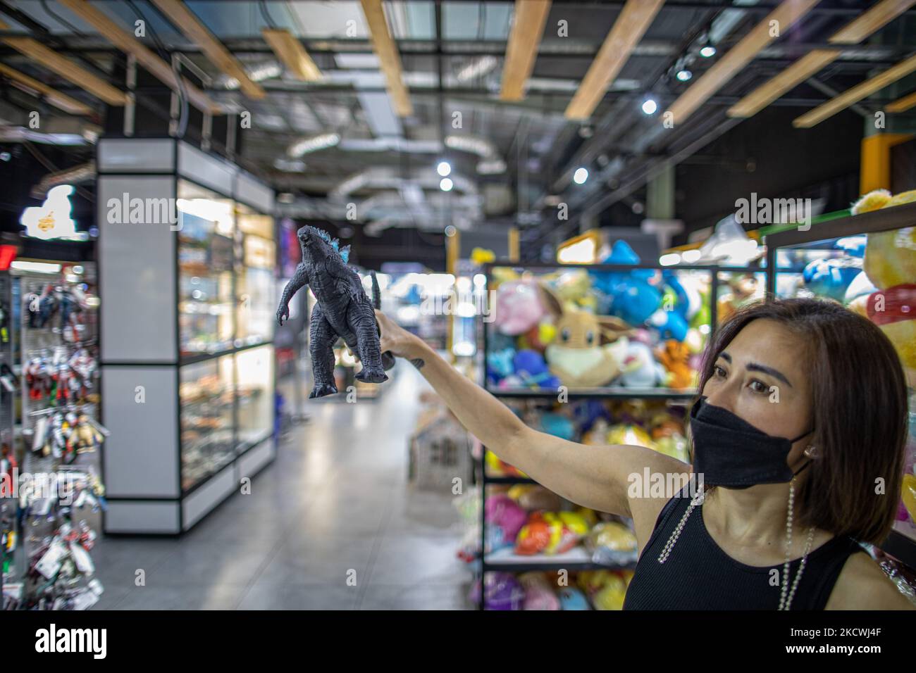 CINDY MADISON KESWIC from Multi Toys shows off a collection of Godzilla ...