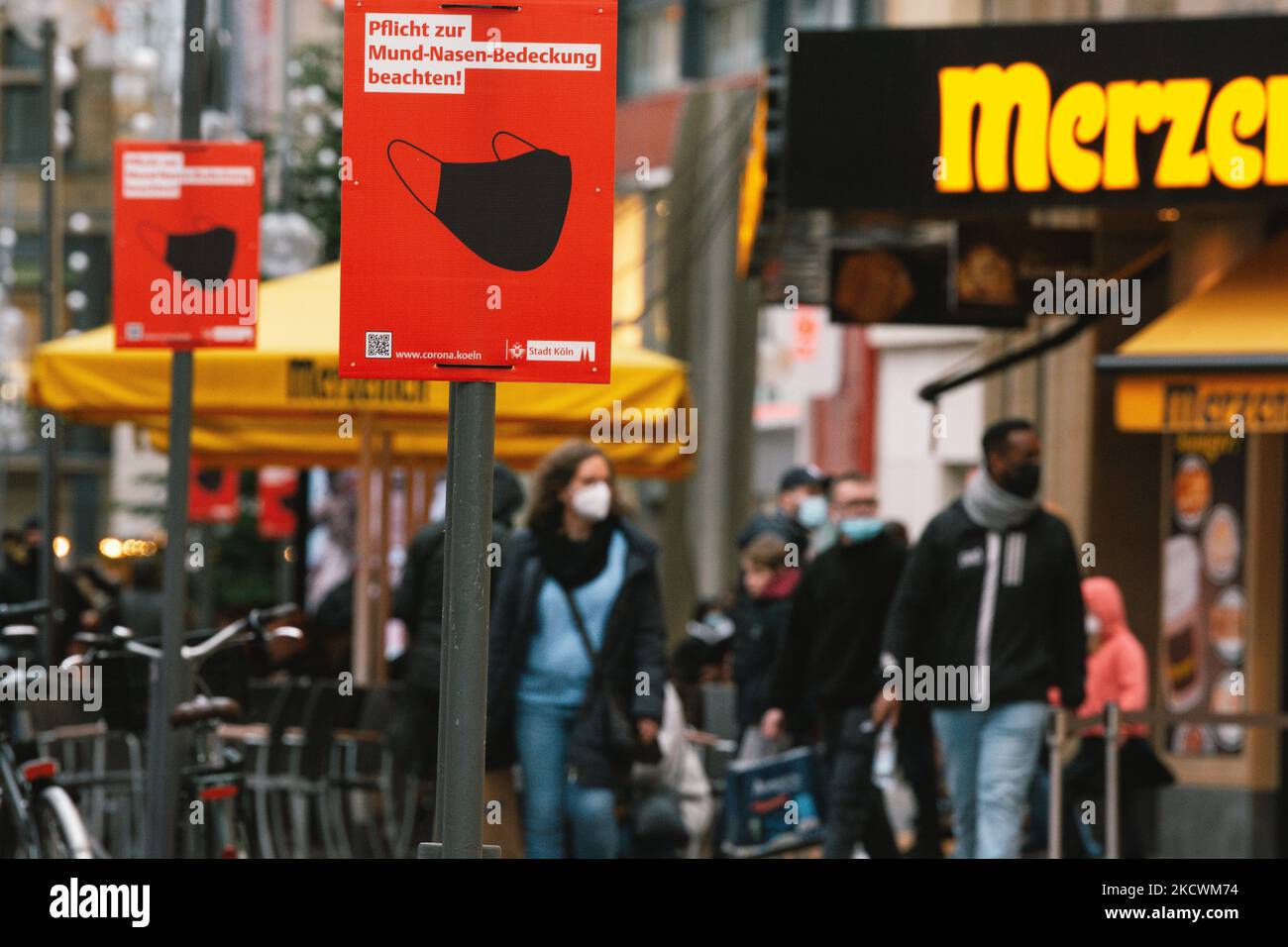 Mask signs are seen in the city center of Cologne, Germany on November ...