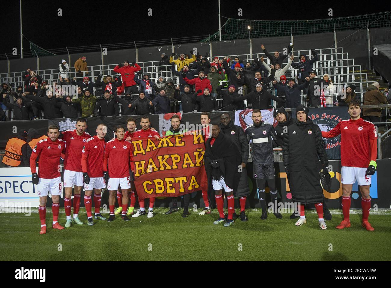 CSKA Sofia players holding a flag ( Even at the end of the world) in ...