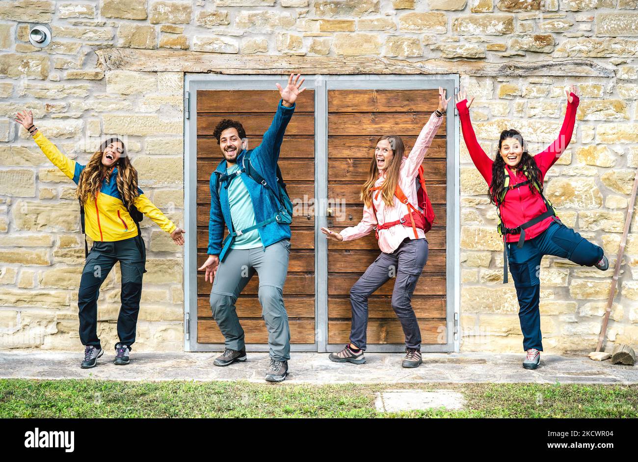 Happy friends having fun at countryside trekking cottage posing for ...