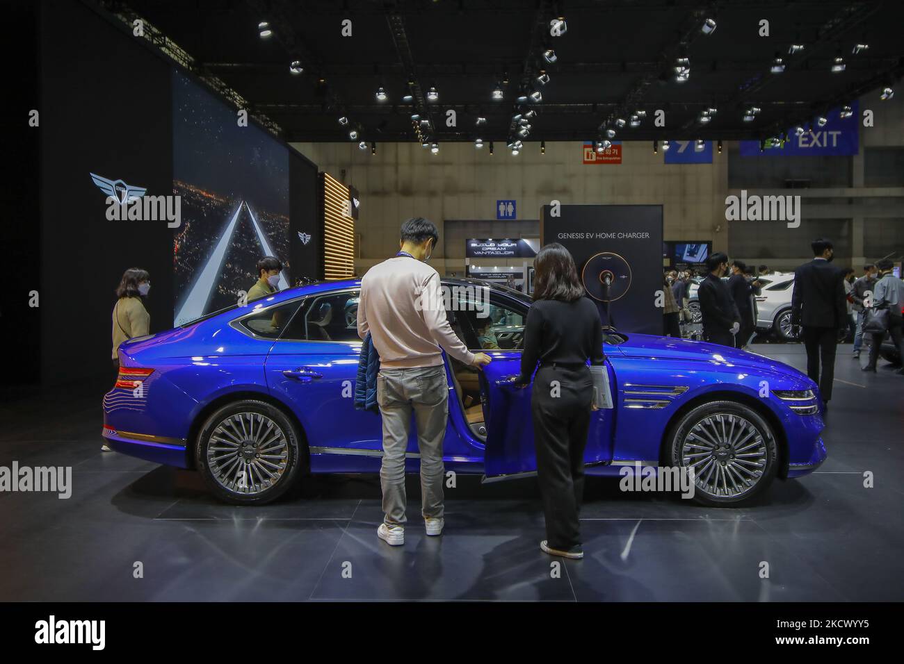 Nov 30, 2021-Goyang, South Korea-Visitors look GENESIS G80 EV and Home ...