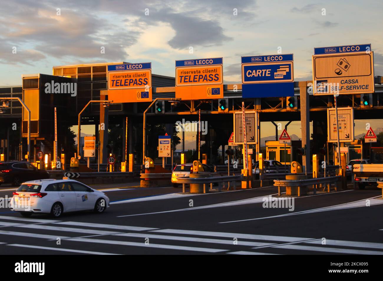 Barriered toll stations with Telepass system on a motorway outside ...