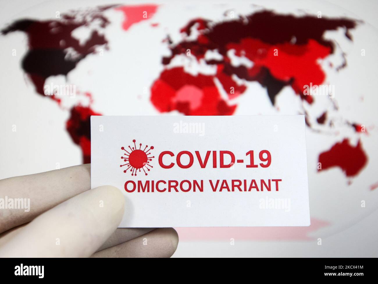 A piece of a paper with words 'COVID-19 Omicron variant' and a ...