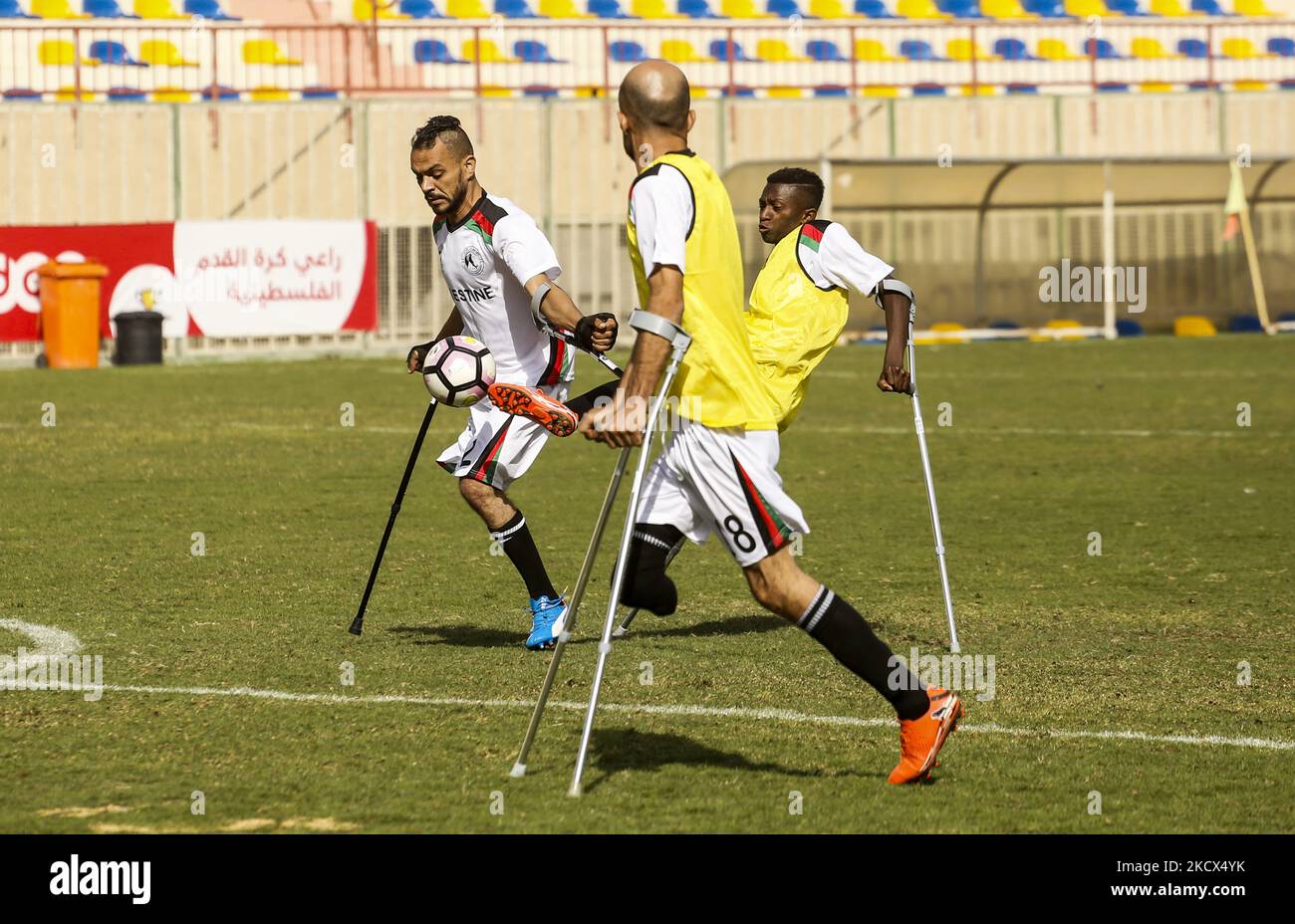 Palestinian amputee players participate in a soccer training session ...