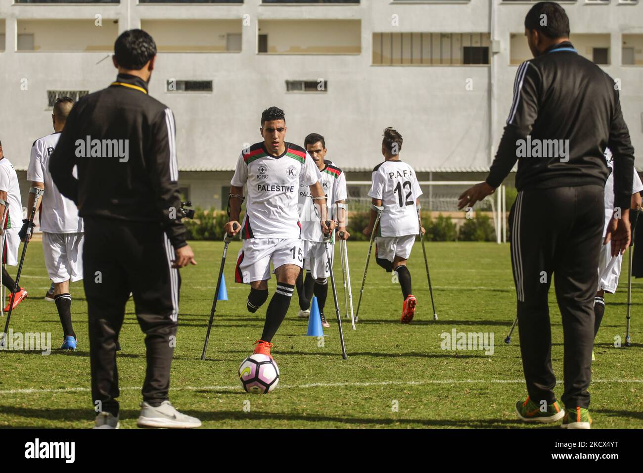 Palestinian amputee players participate in a soccer training session ...