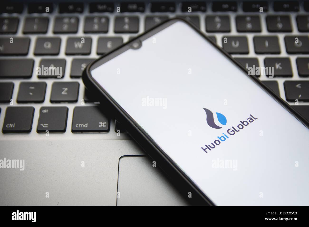 In this photo illustration a Huobi logo seen displayed on a smartphone ...