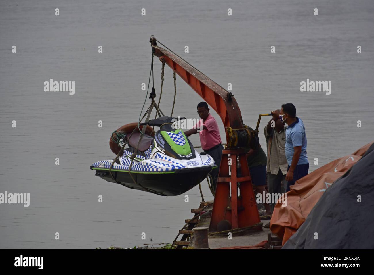 Small speed boat can be seen lifted by Kolkata River Police from the ...