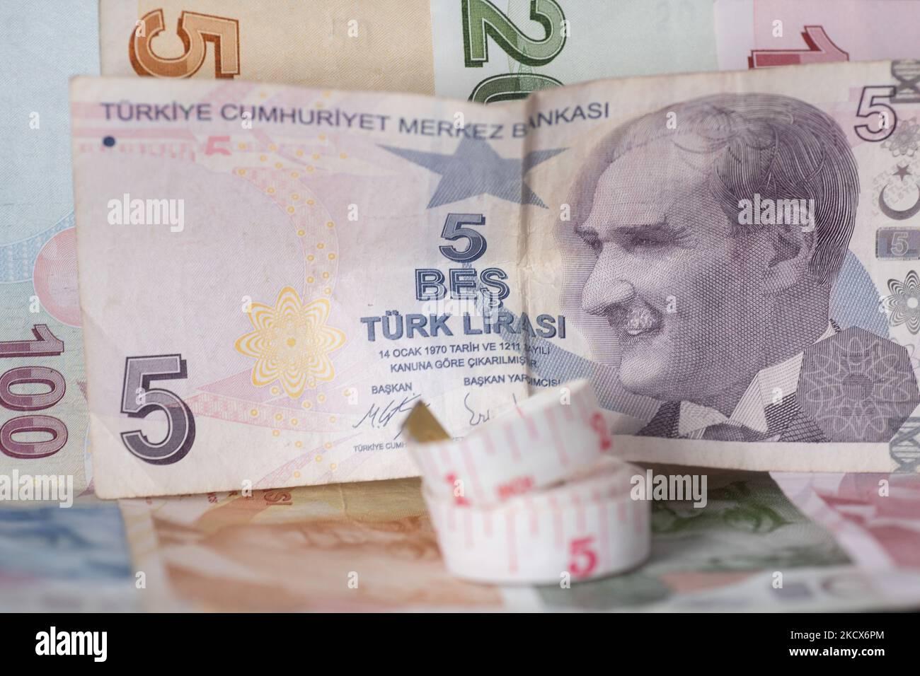 Photo Illustration of Turkish Lira banknotes in black background and a ...