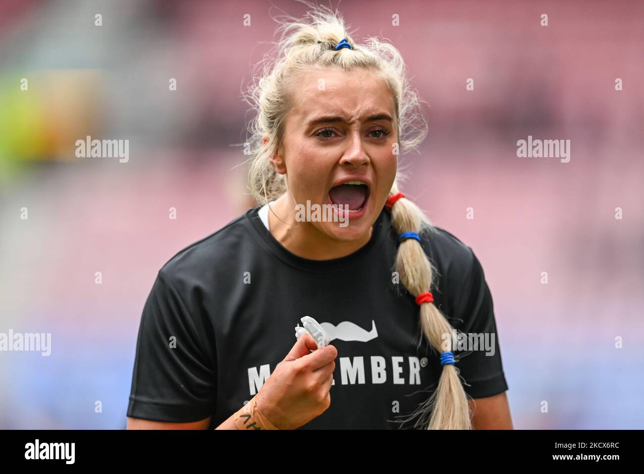 Paige Travis urges her teams on during pre match warm up ahead of the ...