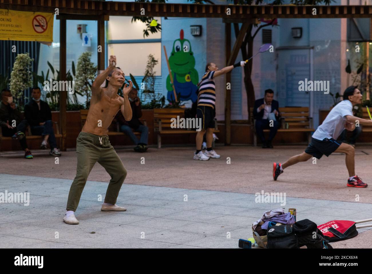 Hong Kong, 3 Dec 2021, Local residents play badminton in Sai Yee Park ...