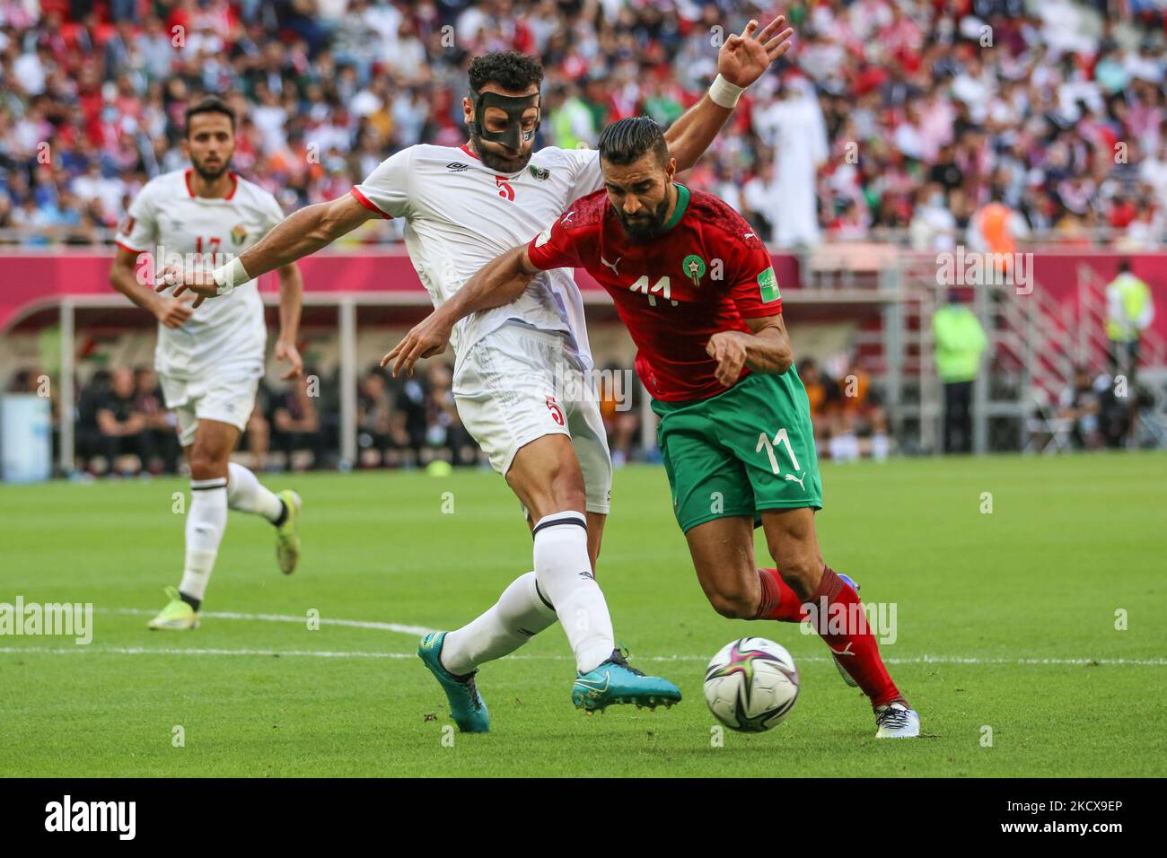 (11) Ismail EL HADDAD of Morocco team battles for possession (5) ALARAB ...