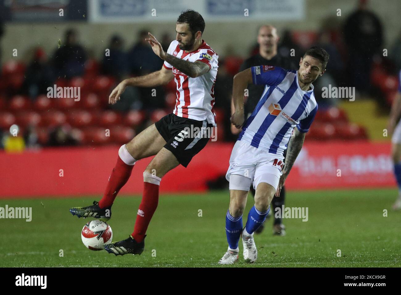 Gavan Holohan of Hartlepool United in action with Lincoln City's Adam ...