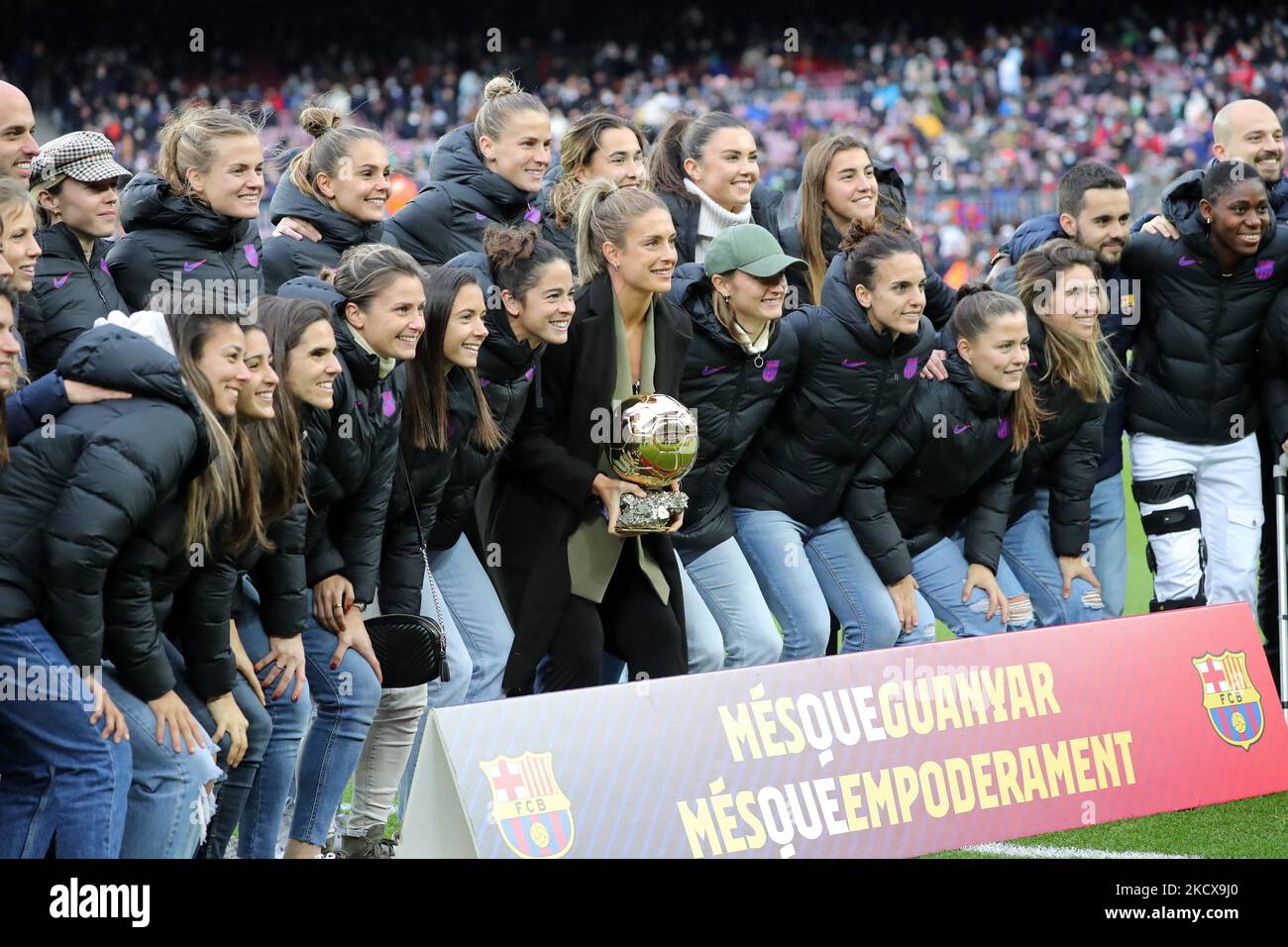 Alexia Putellas offering the Golden Ball trophy to the supporters ...