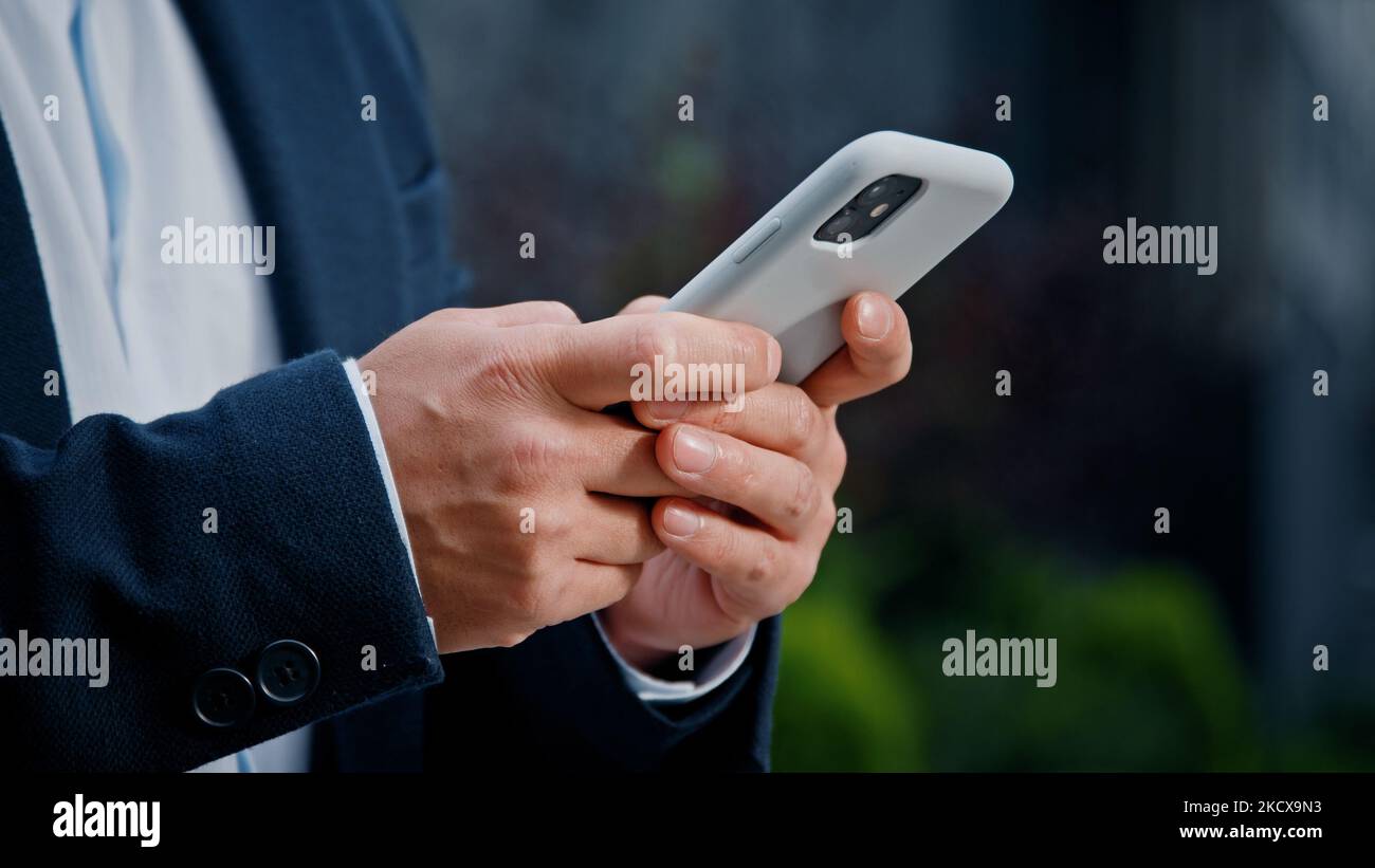 Man in suit tapping fingers hi-res stock photography and images - Alamy