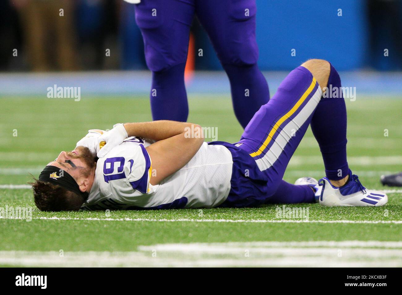 Minnesota Vikings wide receiver Adam Thielen (19) is taken off the ...