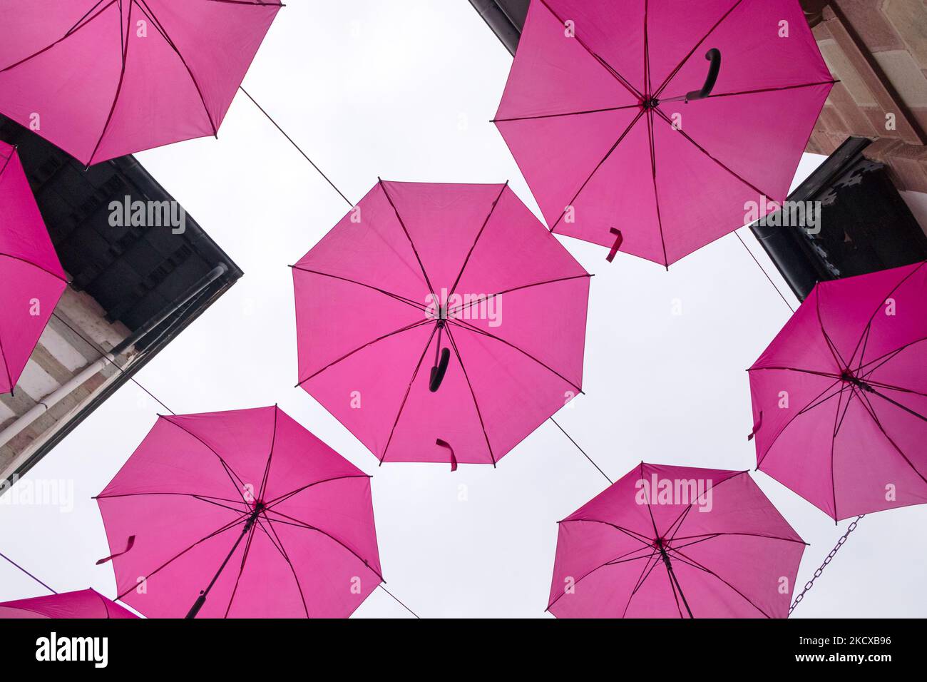 Pink Umbrellas suspended above the Village of Saint-Jean-Pied-de-Port ...