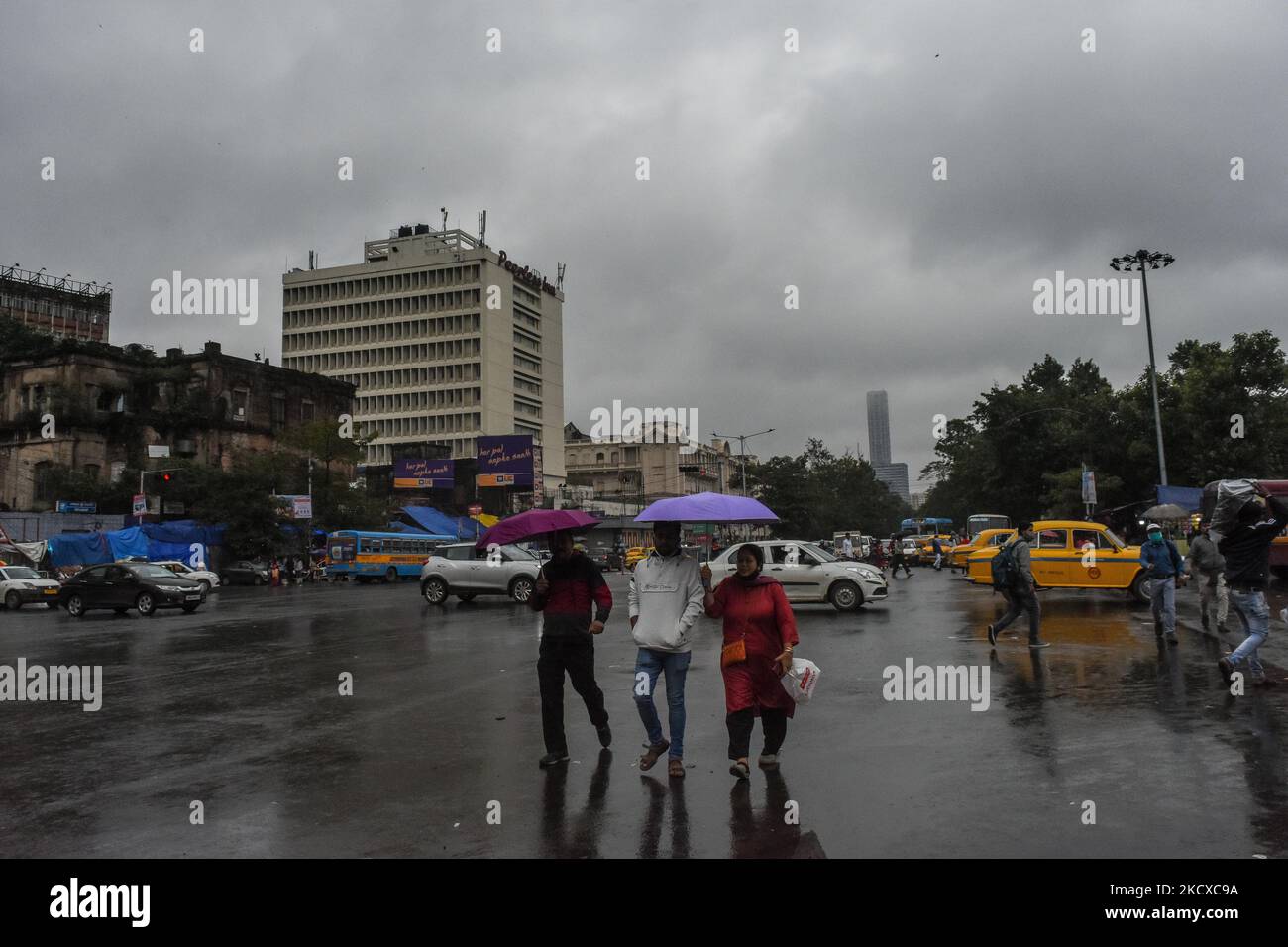 The cityscape is seen covered in thick storm clouds as system of ...