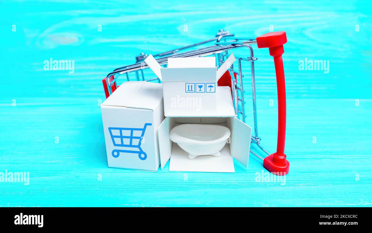 Small labeled shipping boxes with tiny bathtub placed in an overturned ...