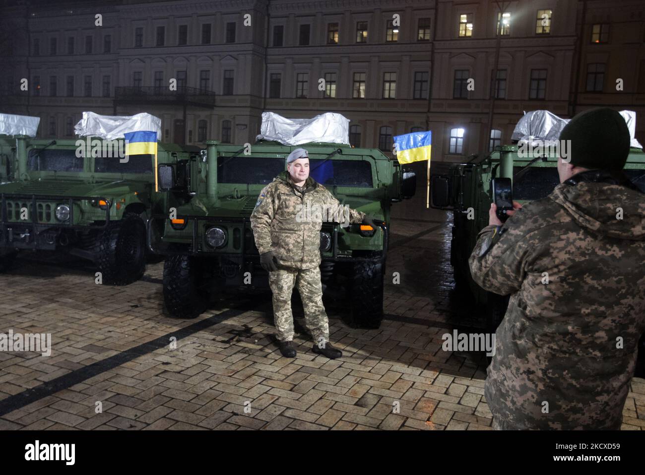 An Ukrainian serviceman poses for a photo before an official ceremony ...