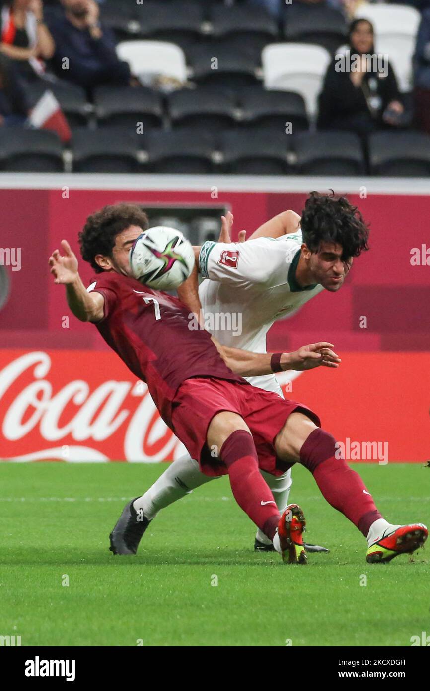 (7) AHMED ALAAELDIN of Qatar team battles for possession (5) HASAN RAED ...