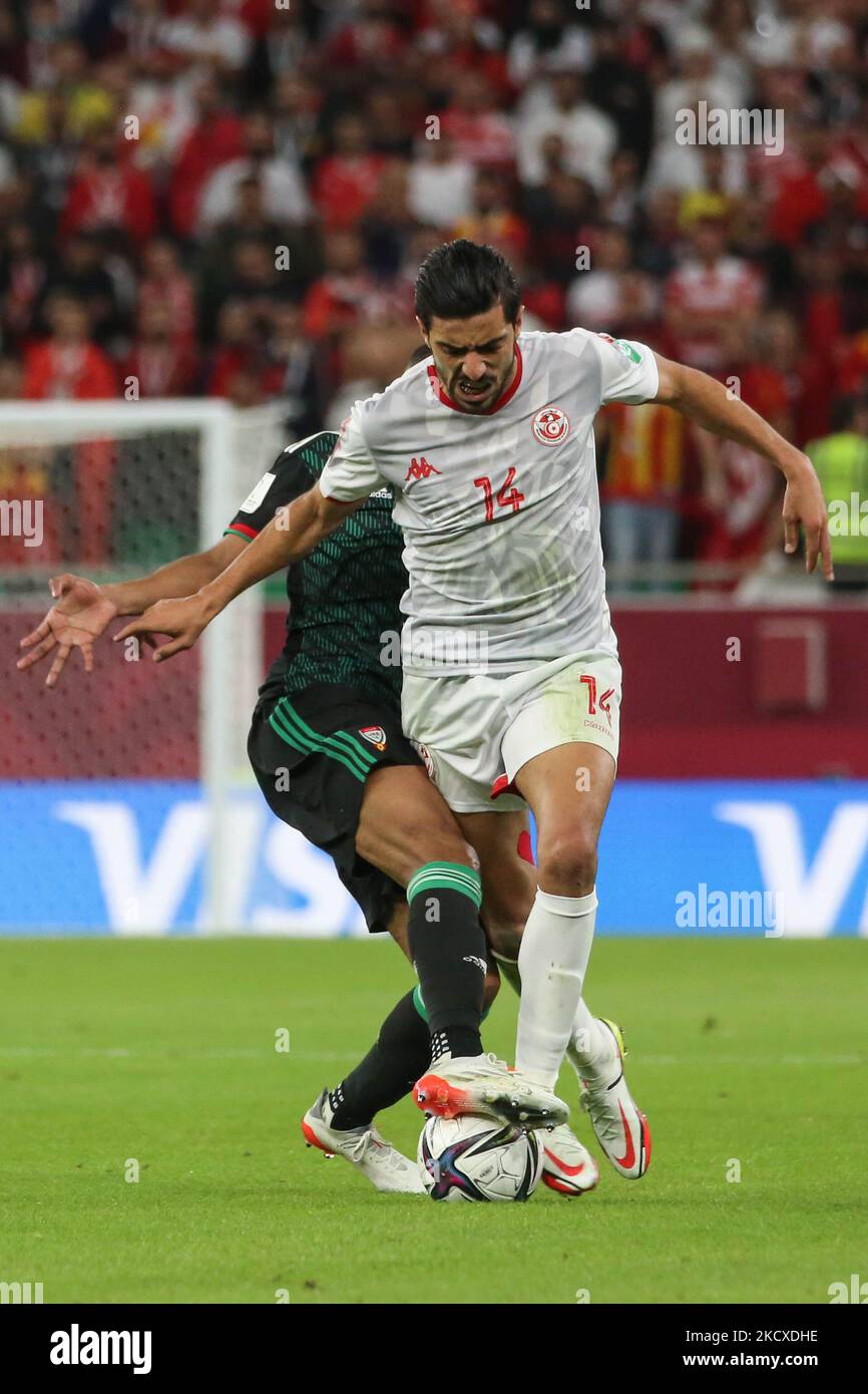 (14) BEN HMIDA Mohamed of Tunisia team battles for possession (5) ALI ...