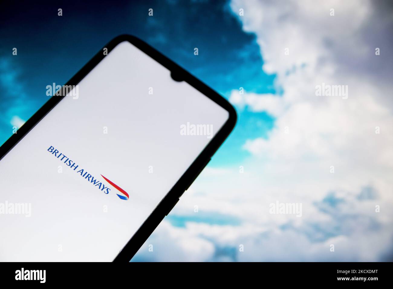 In this photo illustration a British Airways logo seen displayed on a smartphone screen with a ...