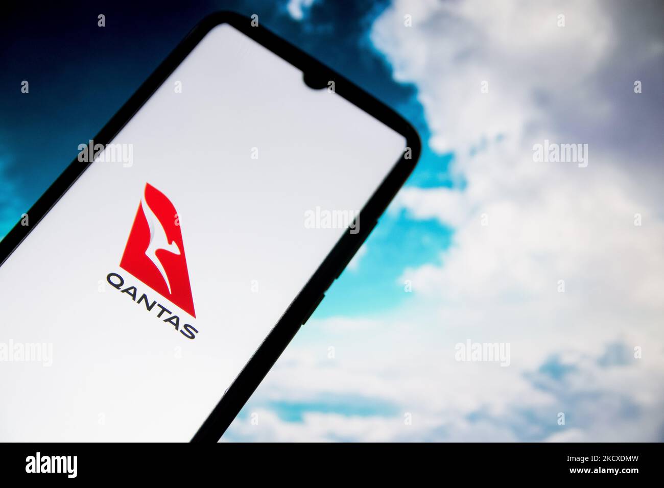 In this photo illustration a Qantas Airways airlines logo seen ...