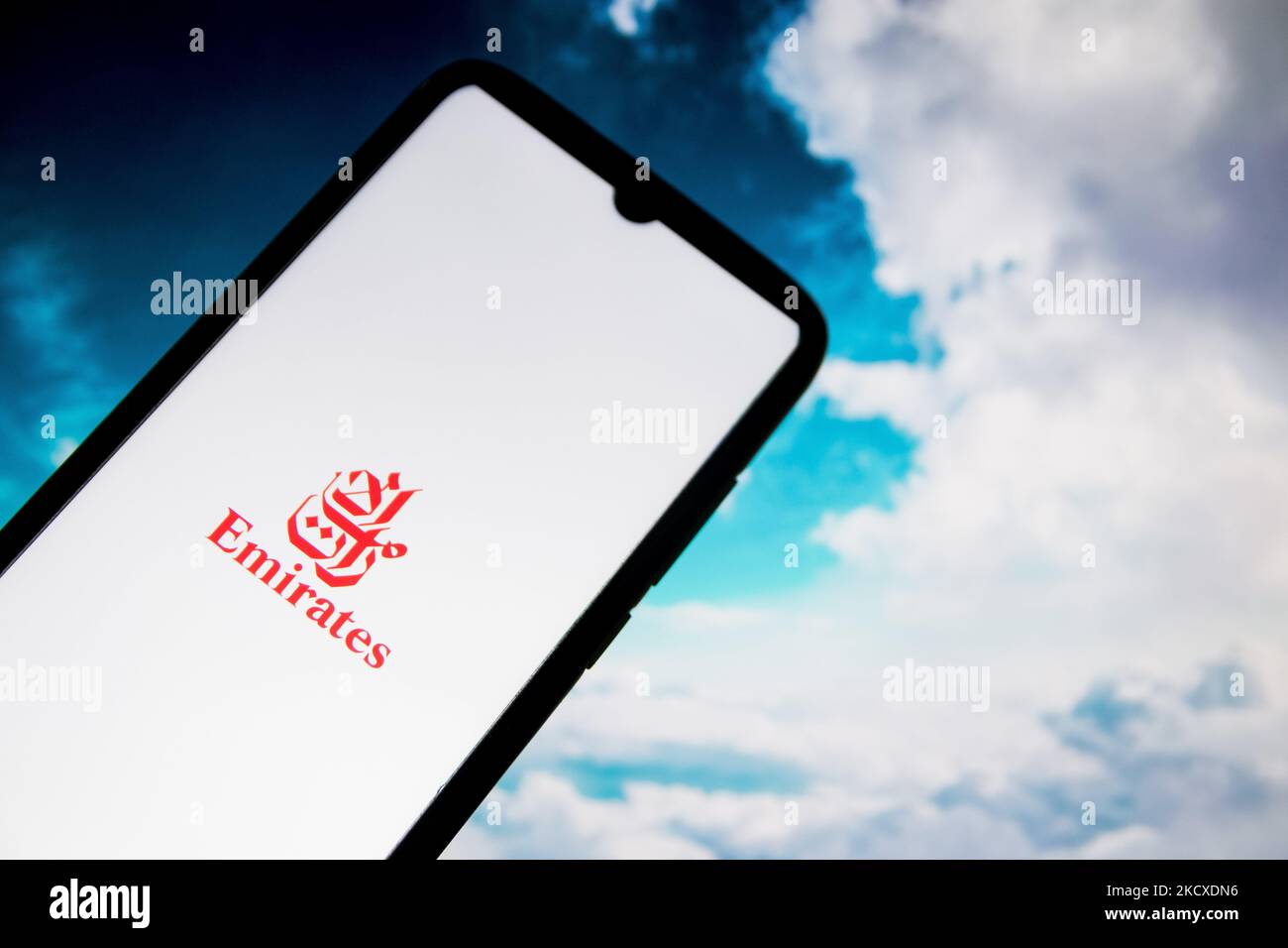 In this photo illustration an Emirates airlines logo seen displayed on ...