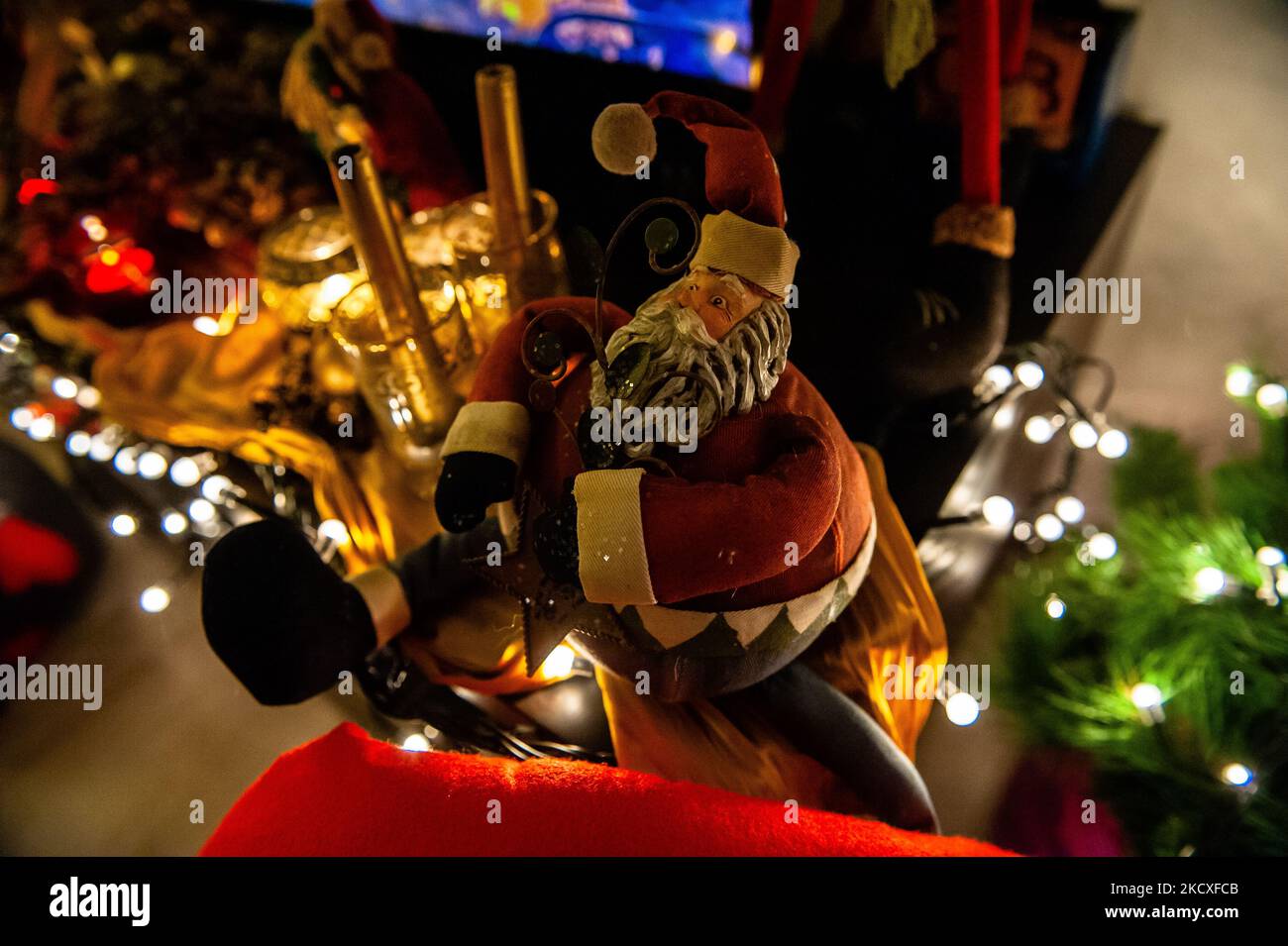 Christmas decorations are already set up in the living room of a home ...