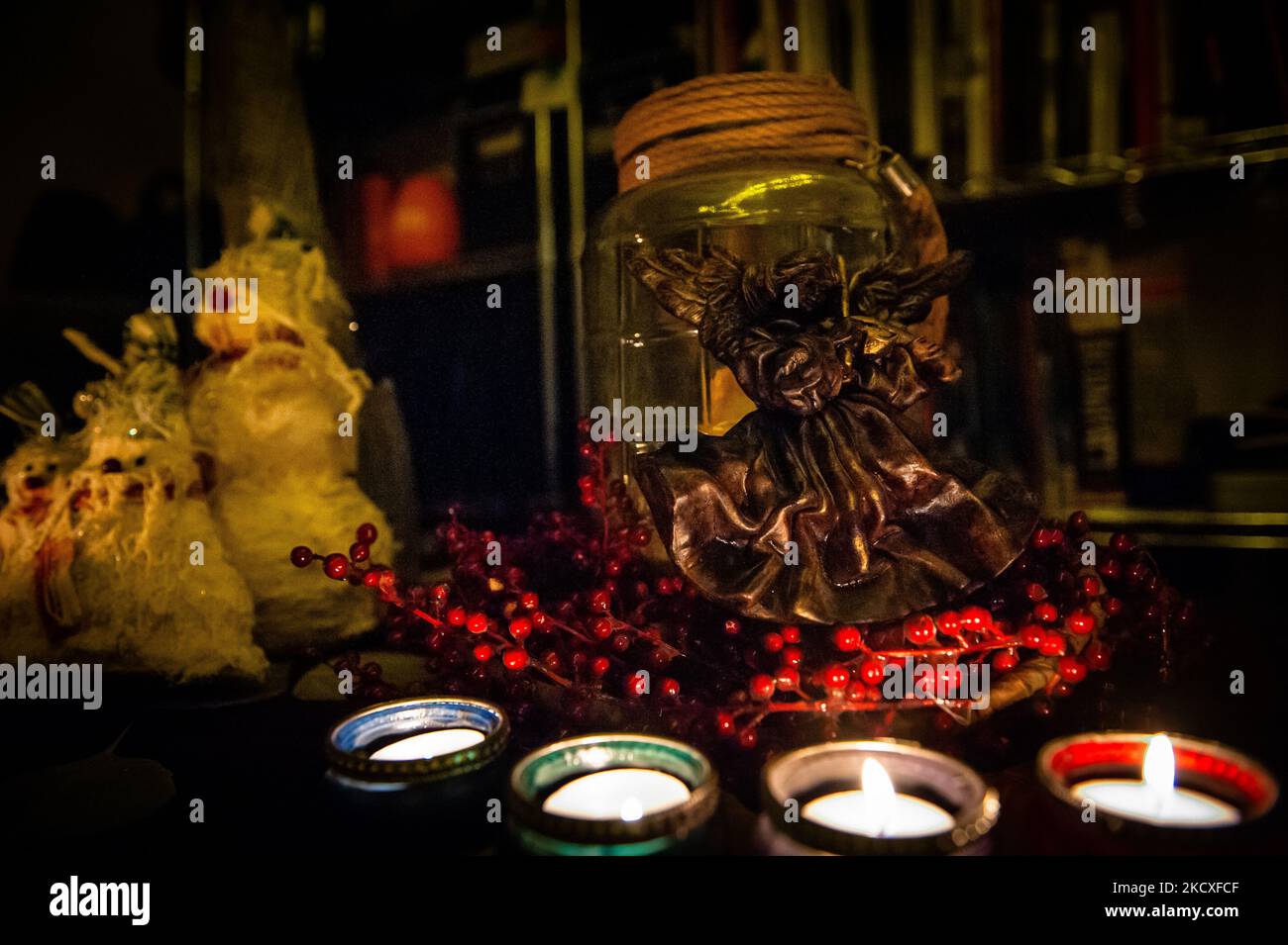 Christmas decorations are already set up in the living room of a home ...