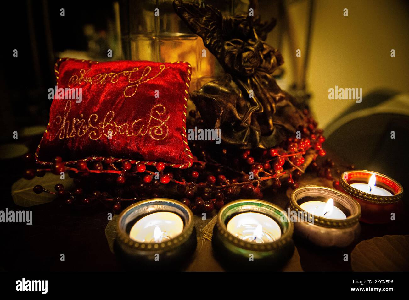 Christmas decorations are already set up in the living room of a home ...