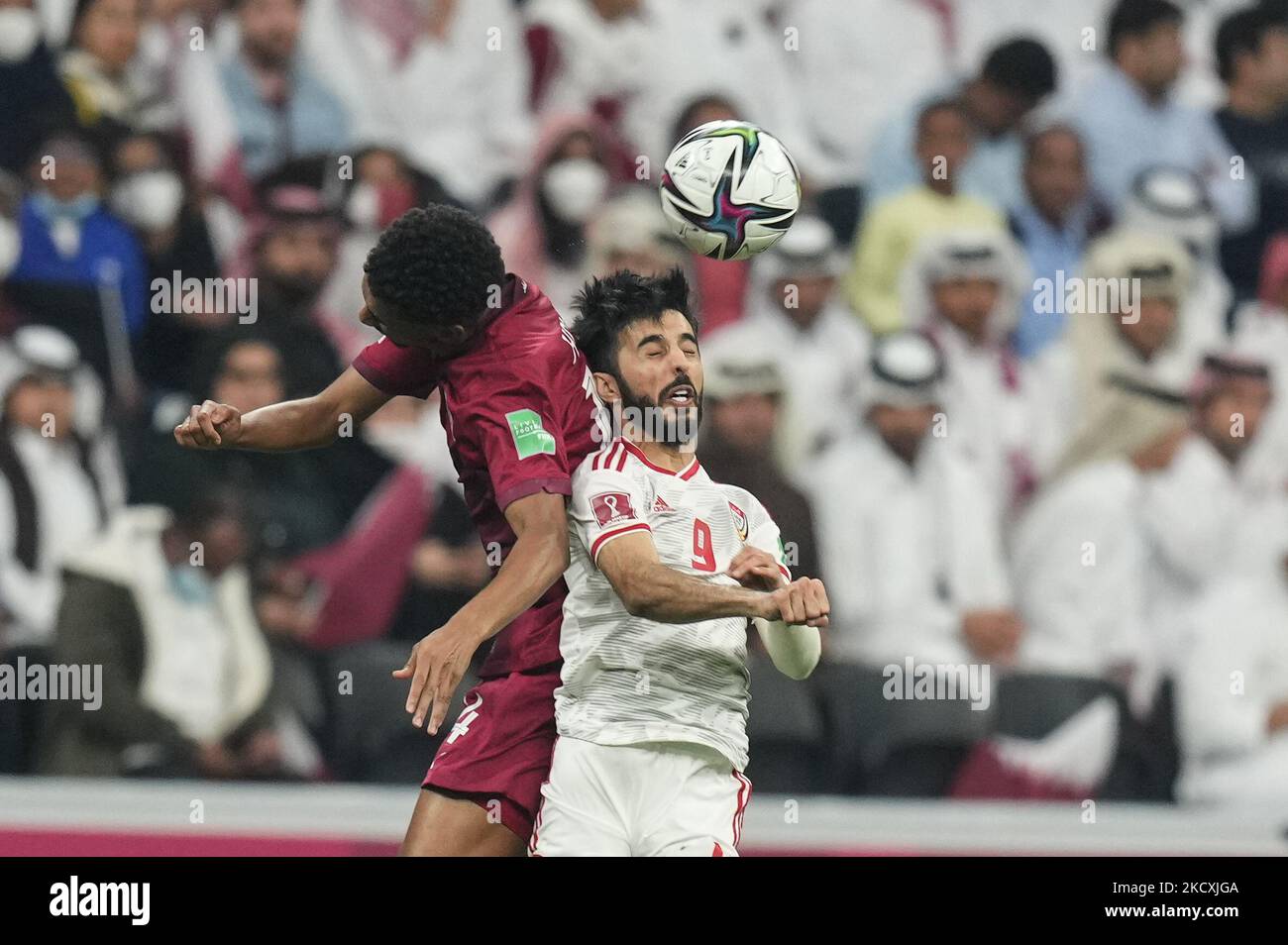 (4) MOHAMMED WAAD of Qatar team battles for possession with (9) BANDAR ...