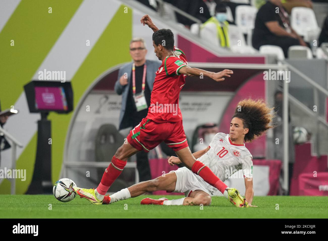(10) MEJBRI Hannibal of Tunisia team battles for possession with (9) AL ...
