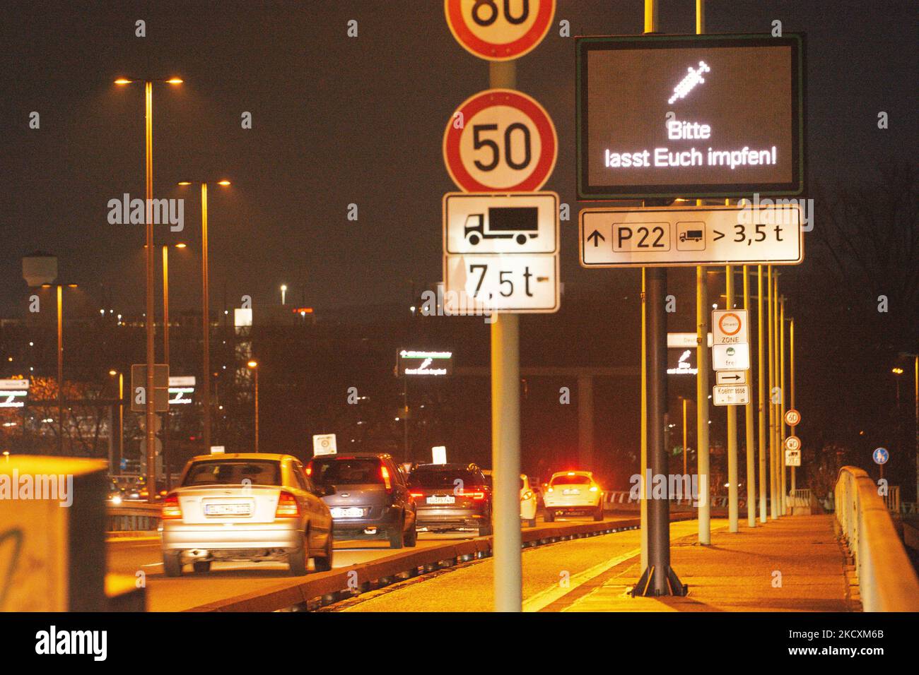 " please vaccination" sign is seen on the autobahn in Cologne, Germany ...