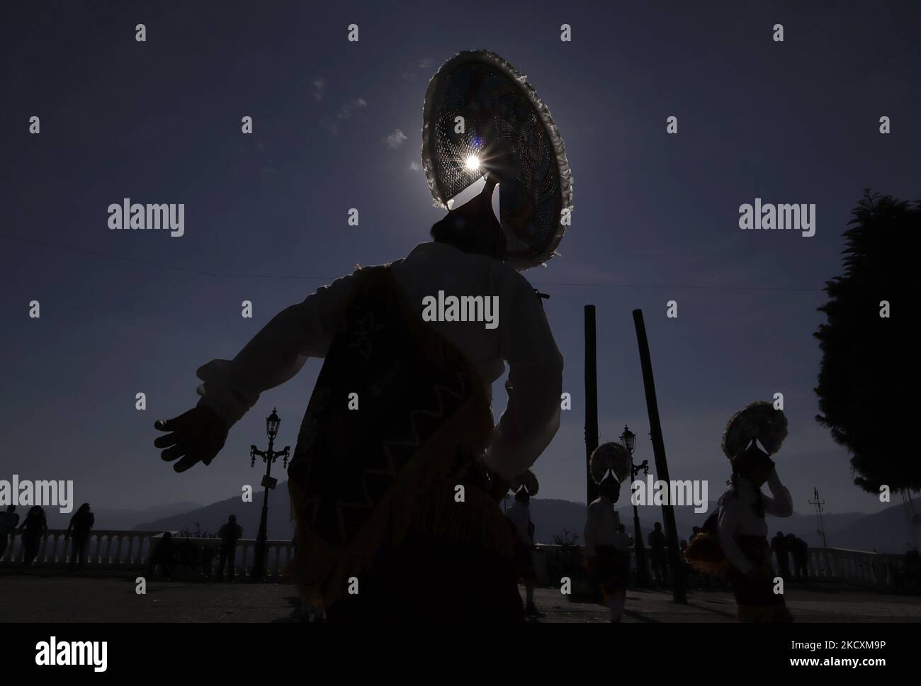 Backlighting of dancers and pilgrims while performing the Dance of the ...