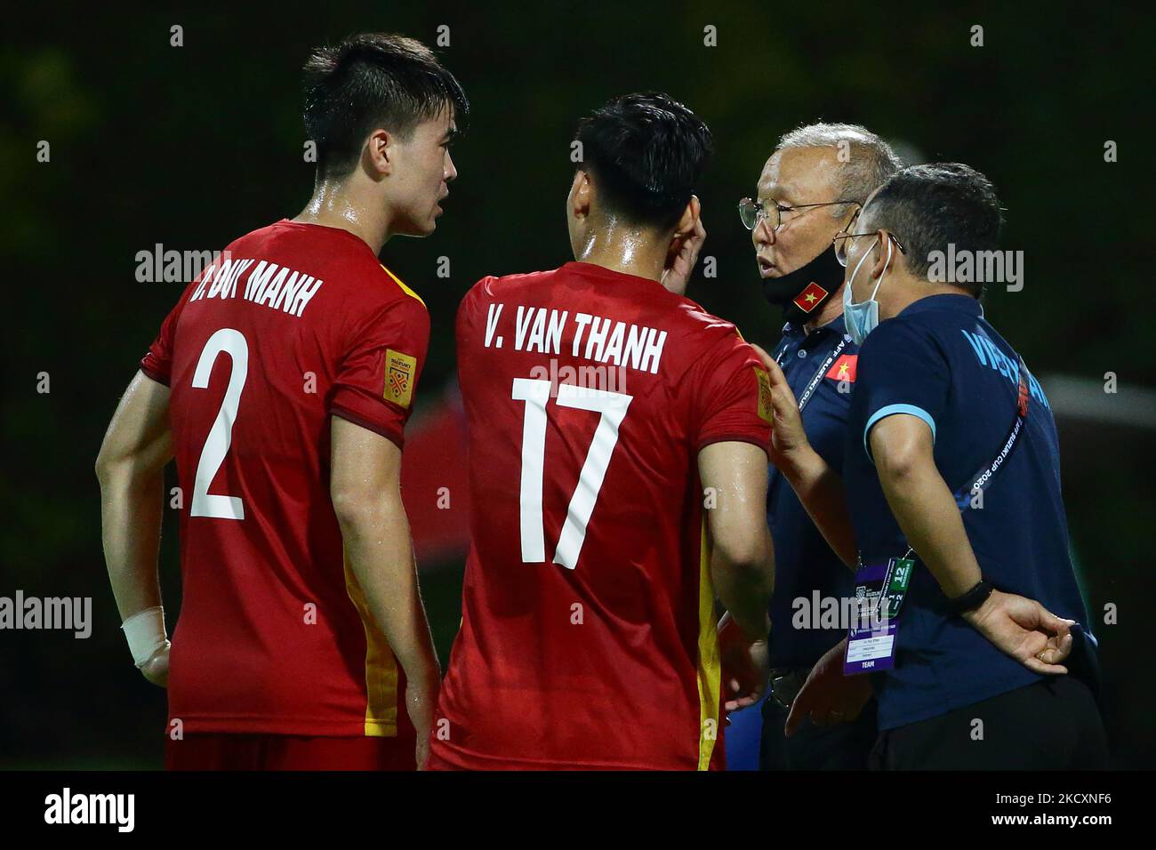 Vietnam Head Coach, Park Hang Seo (2nd R) gives instruction to Do Duy Manh (L) and Vu Van Thanh ...