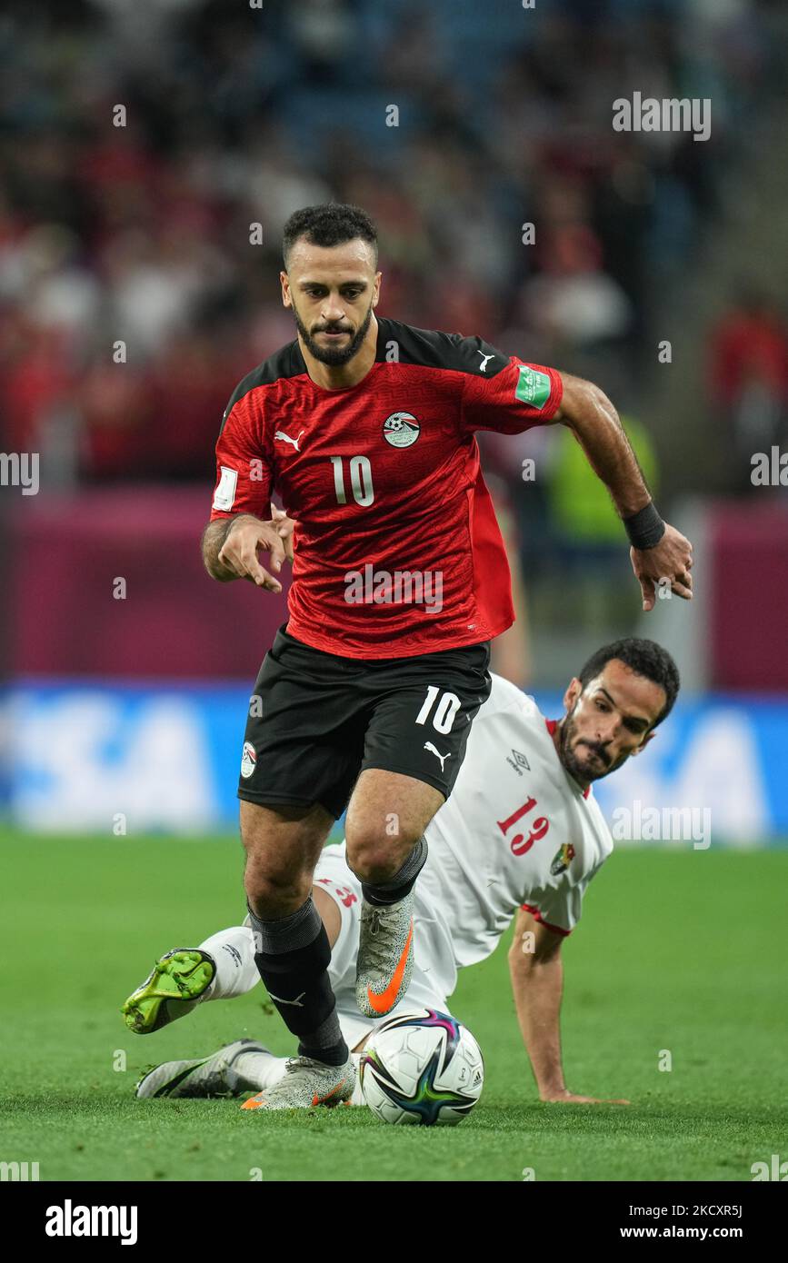 (10) MARWAN HAMDY of Egypt team battles for possession with (13) MAHMOUD ALMARDI of Jordan team ...