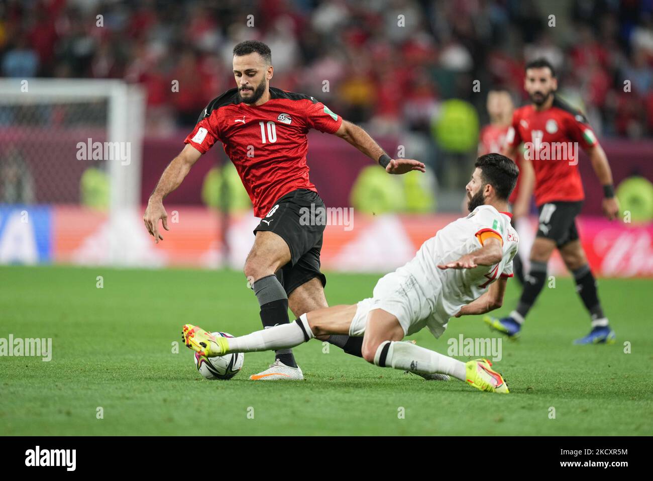 (10) MARWAN HAMDY of Egypt team battles for possession with (4) BAHA ...