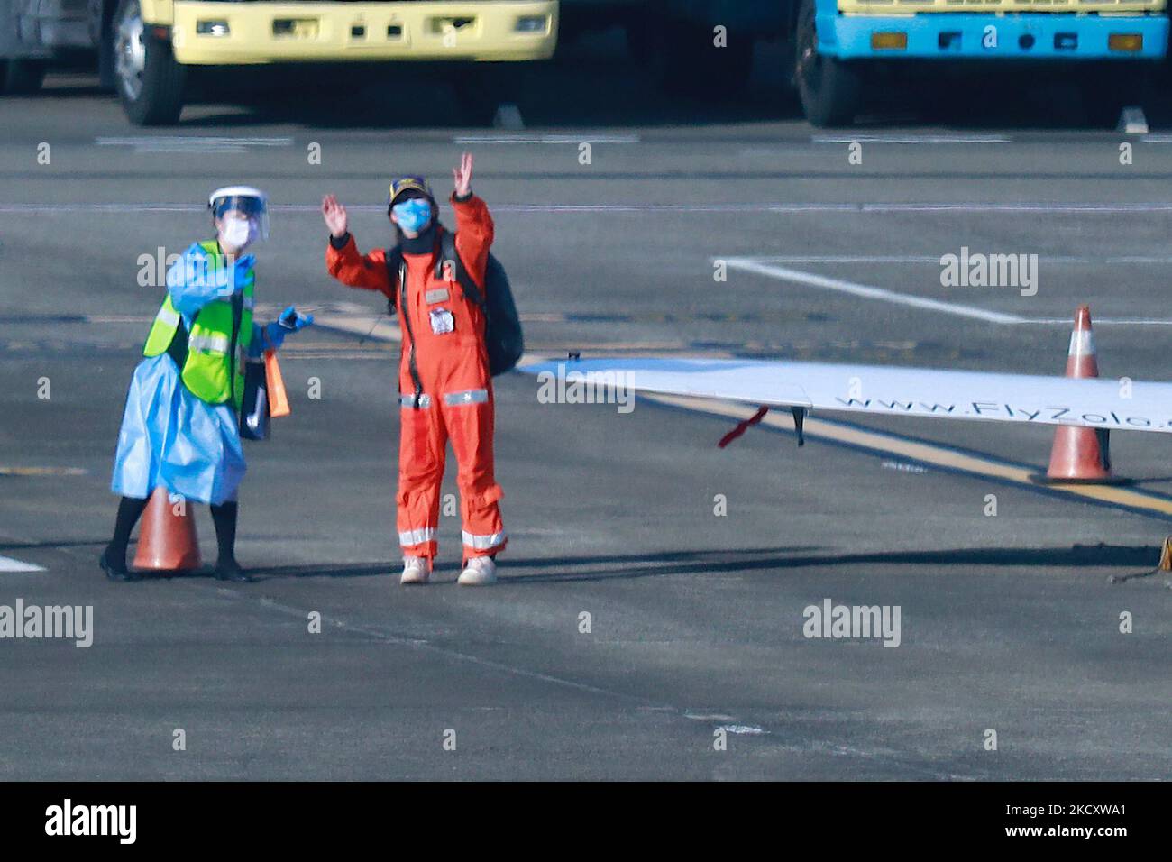 The 19-year-old British-Belgian pilot Zara Rutherford waves to the ...