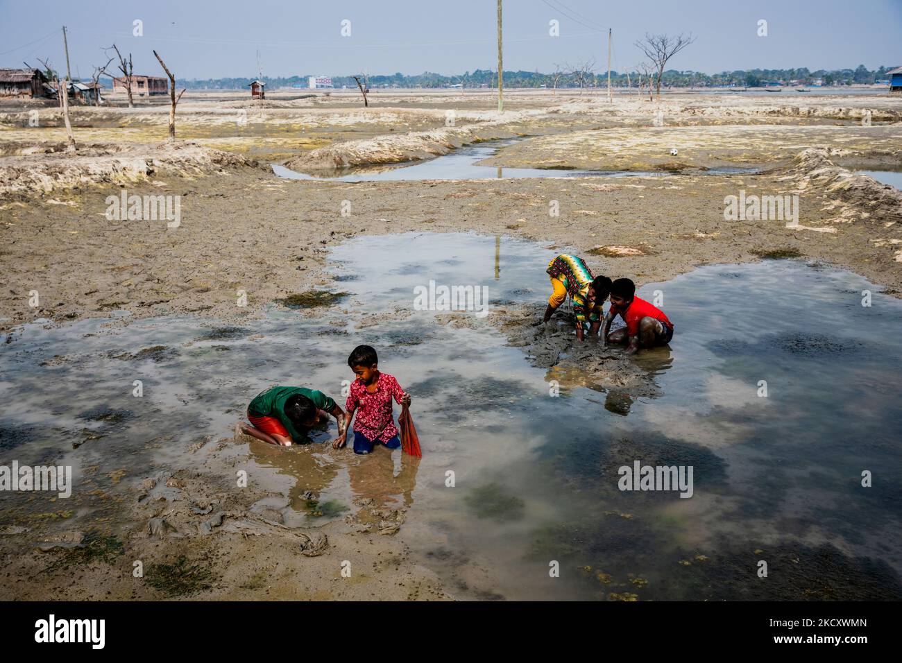 People of Cyclone Sidr and Cyclone Aila affected area seen fishing in ...