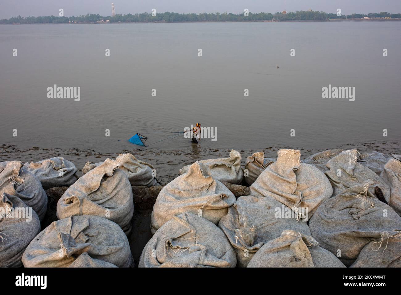 People of Cyclone Sidr and Cyclone Aila affected area seen fishing in ...