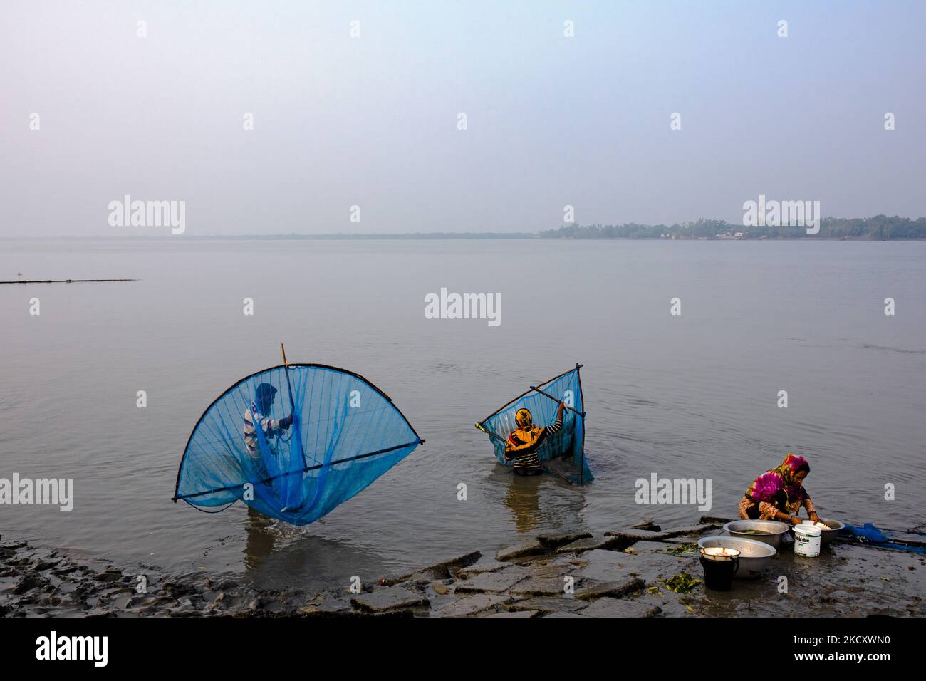 People of Cyclone Sidr and Cyclone Aila affected area seen fishing in ...