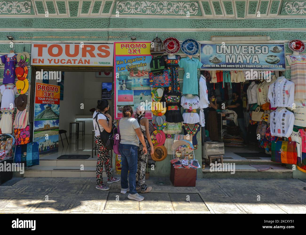 Visitors in front of a shop with gifts and souvenirs. On Tuesday ...