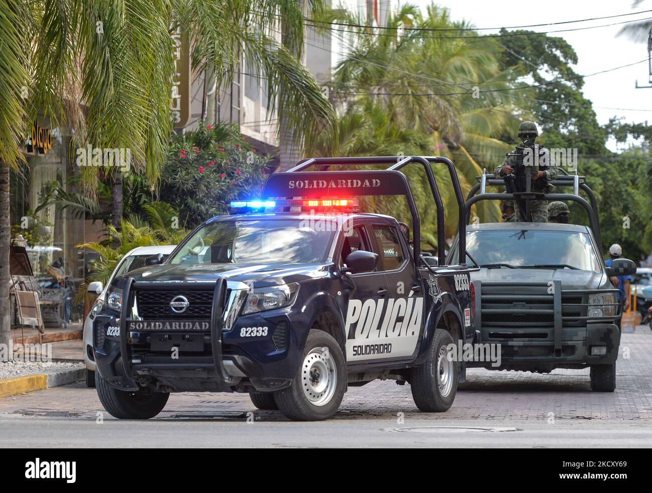 Members of the Police and the Mexican Army patrol the center of Playa ...
