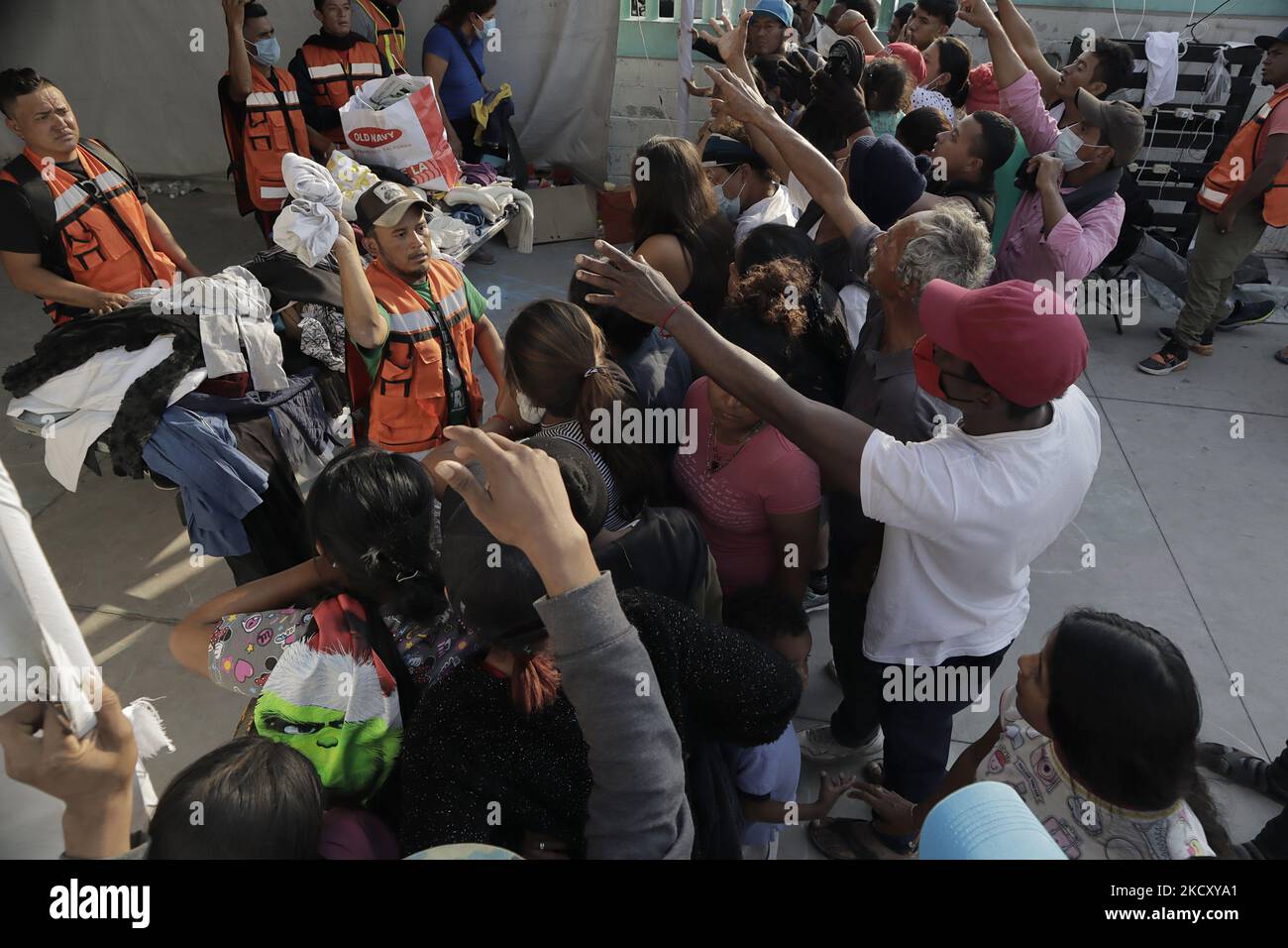 Central American Migrants Receive Donations Of Clothing At The Casa