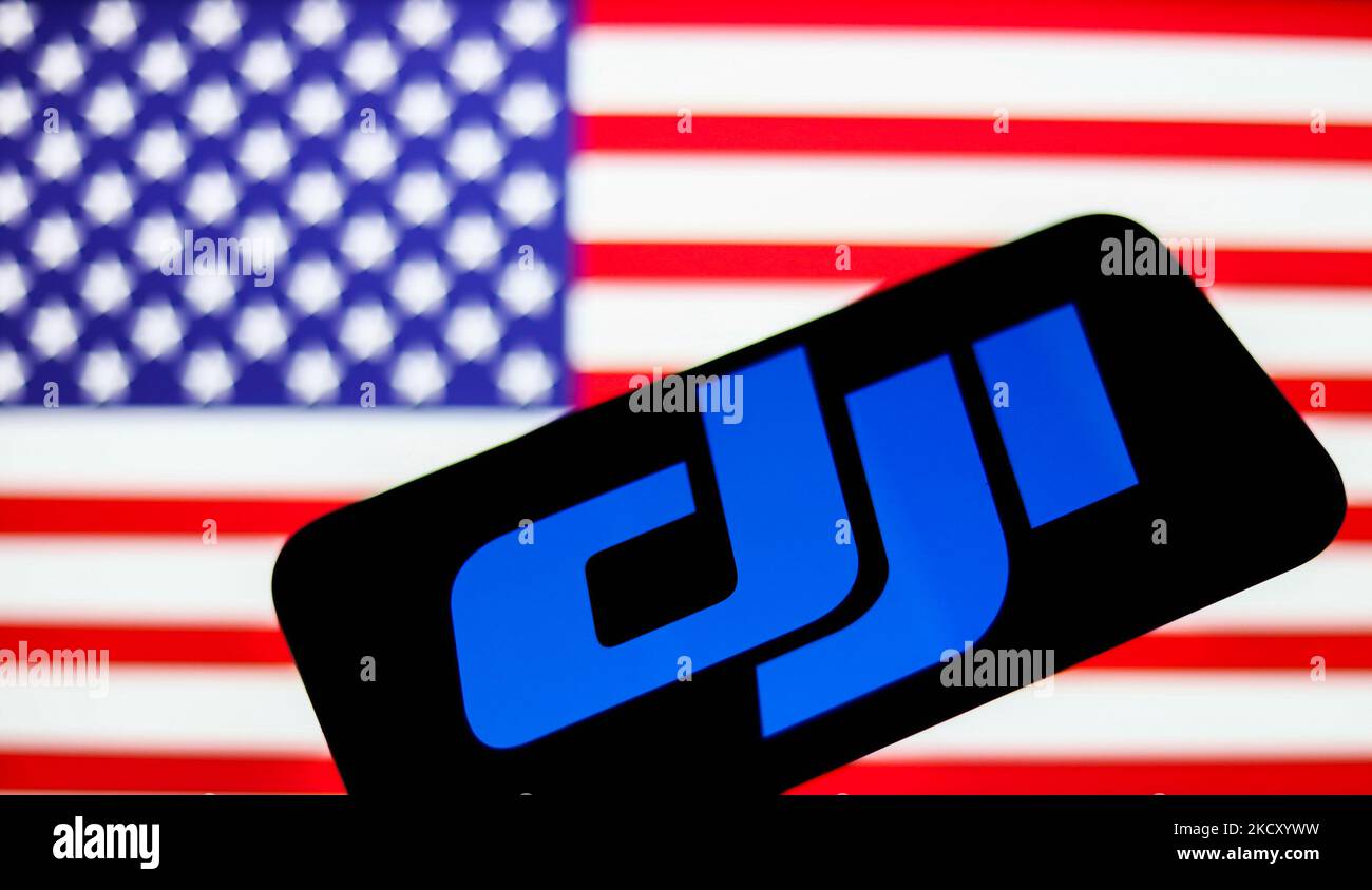 DJI logo displayed on a phone screen and American flag displayed in the ...