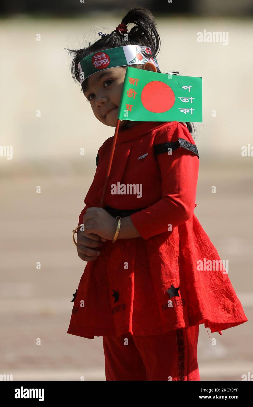 Bangladeshi child holds national flag hi-res stock photography and ...
