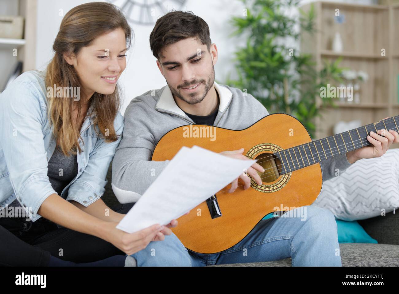 Holding sheet music hi-res stock photography and images - Alamy